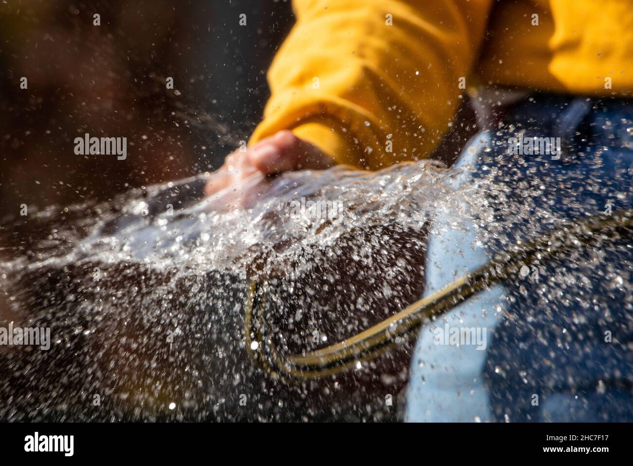Young man spitting water hi-res stock photography and images - Alamy
