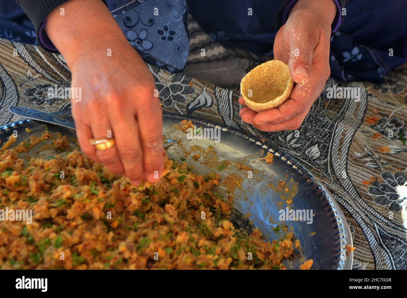 woman making kibbeh with her hand Stock Photo - Alamy