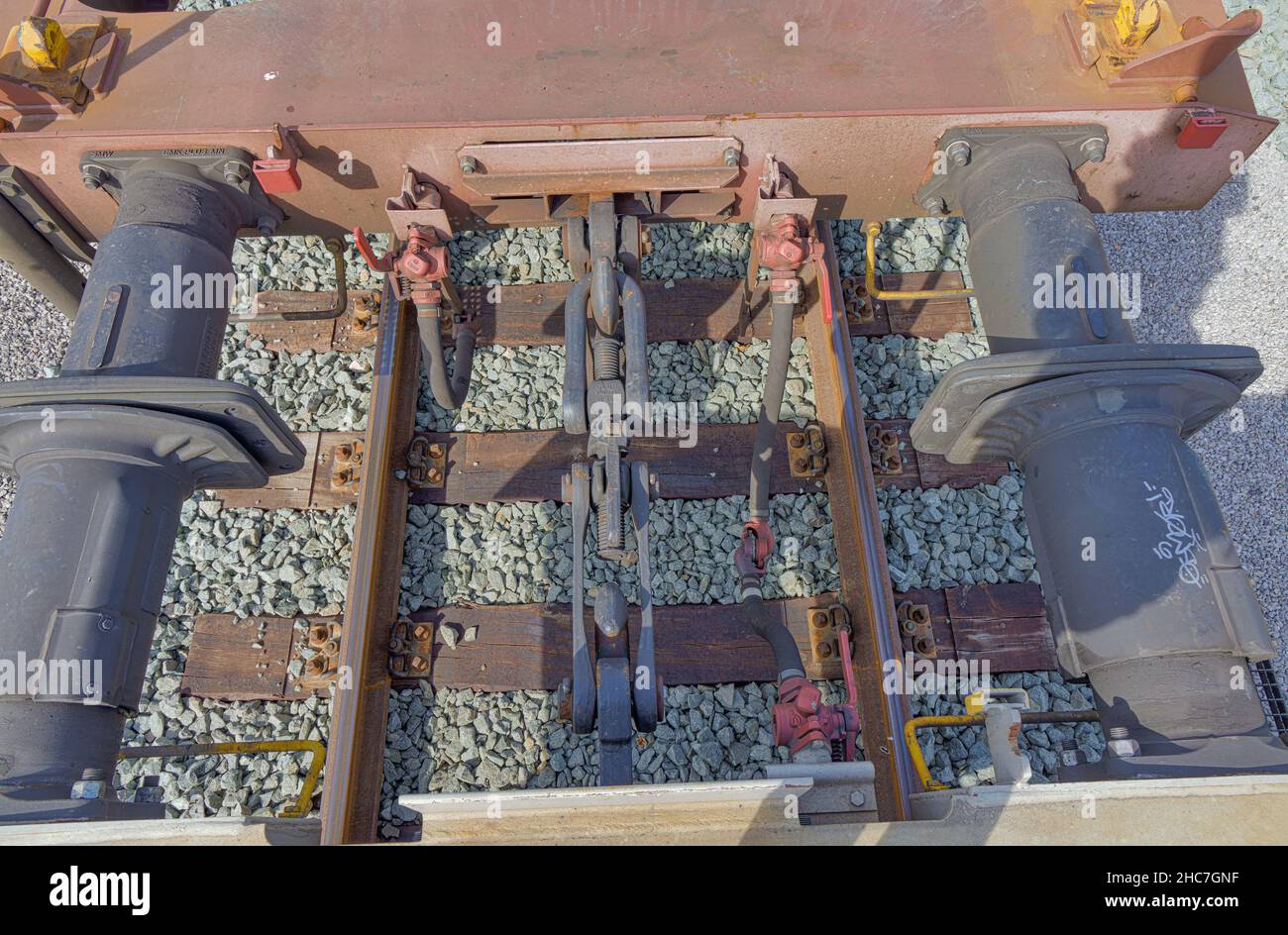 Freight train connected wagons on the railroad tracks Stock Photo - Alamy
