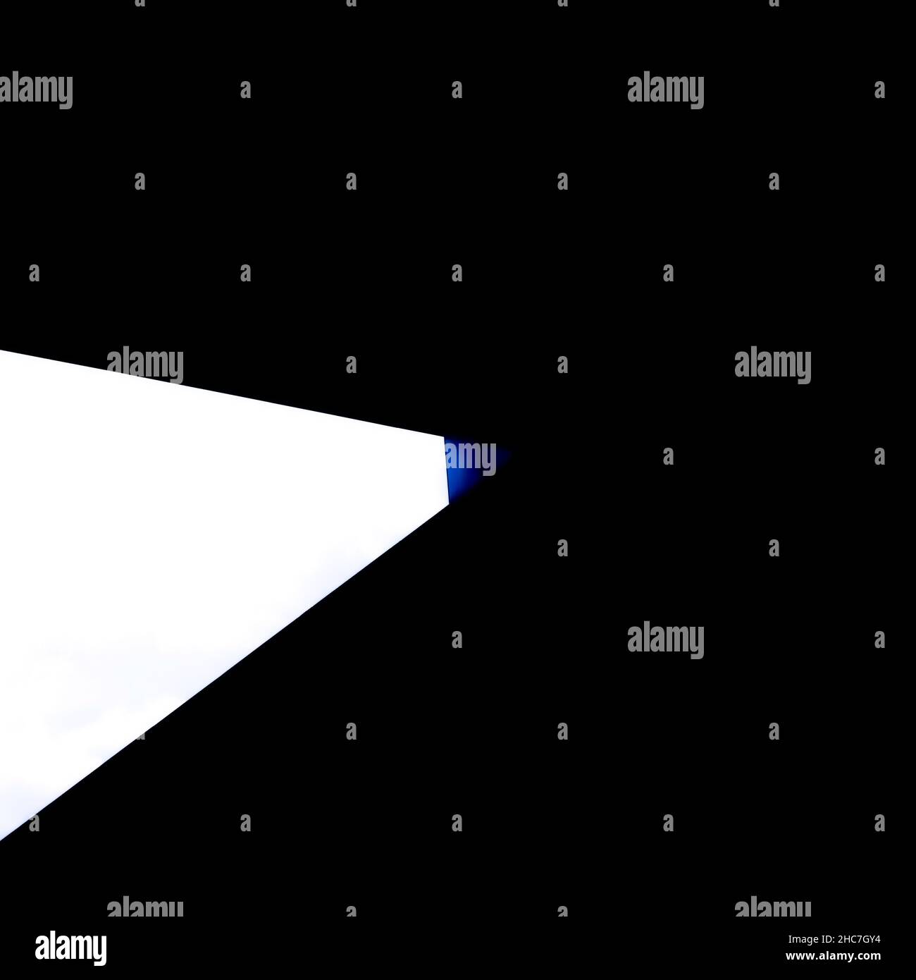 Light falling on the angle of a wall on dark background Stock Photo - Alamy