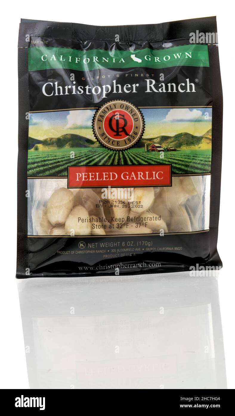 Winneconne, WI -21 December 2021: A package of Christopher ranch peeled ...