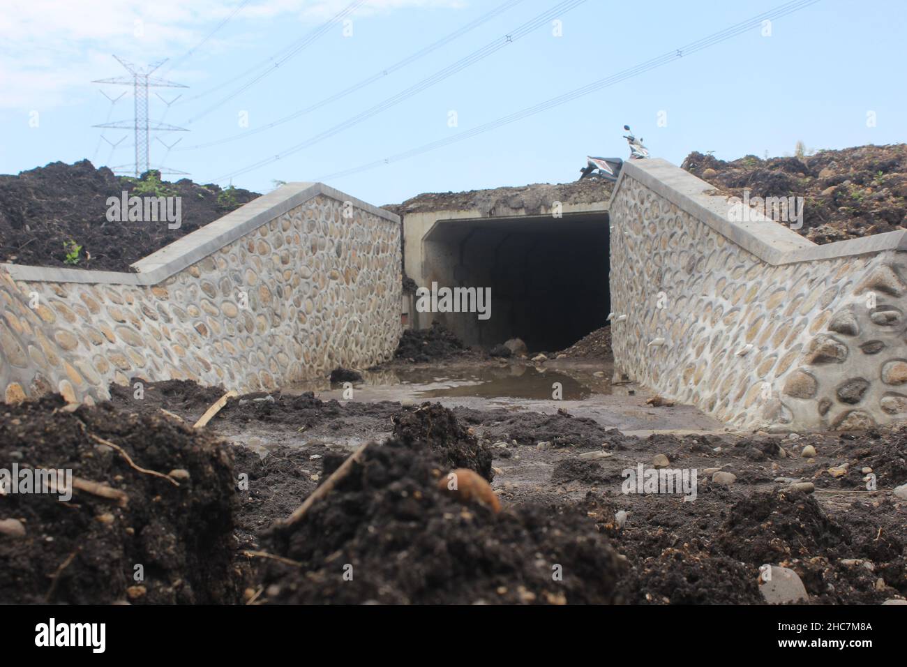 drainage water channel on the side of the road as a place for water ...