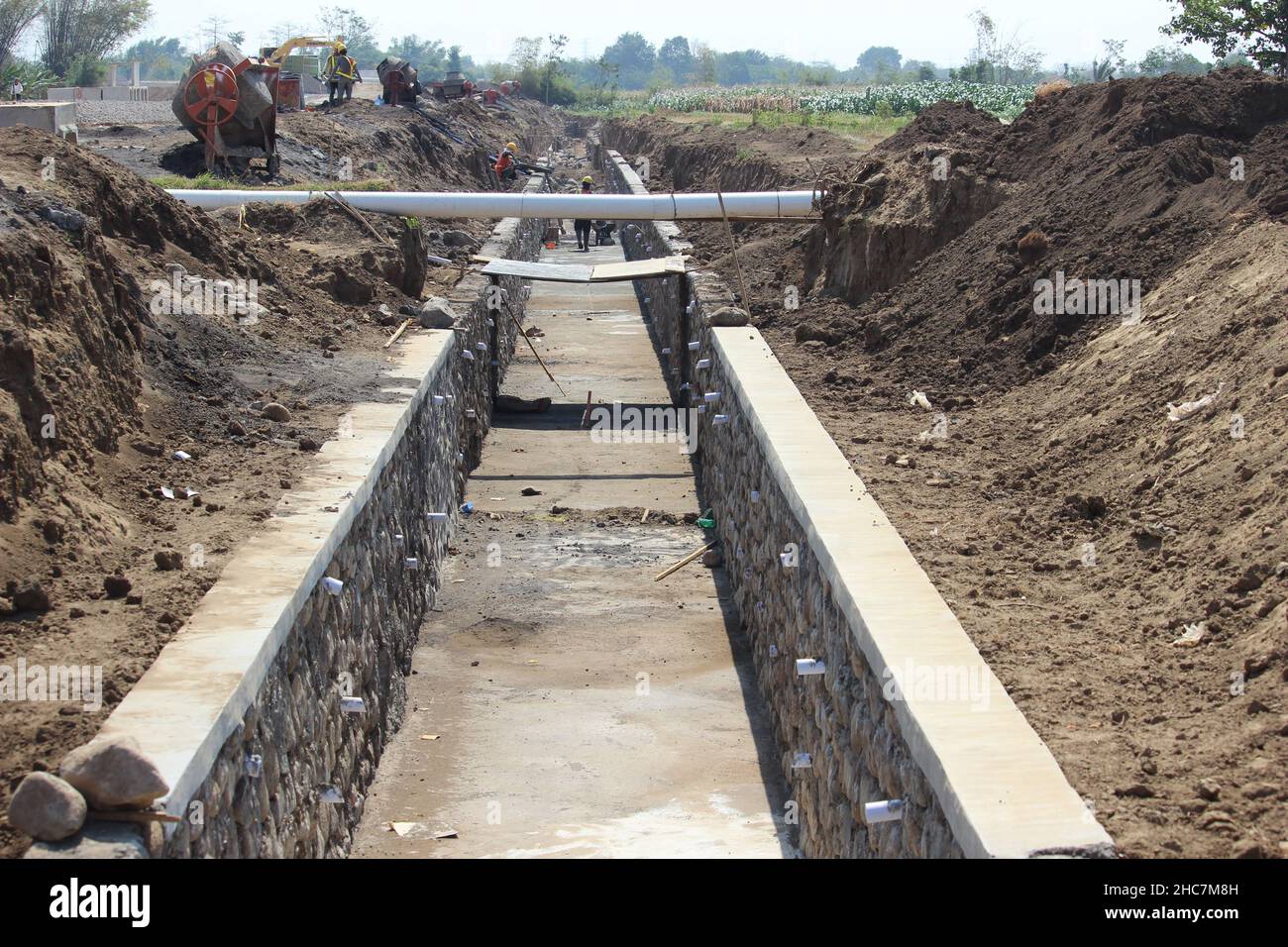 drainage water channel on the side of the road as a place for water ...