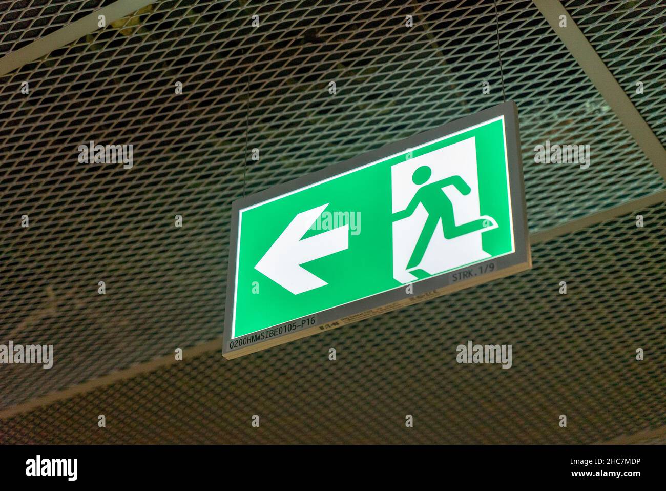 Green sign showing the entrance Stock Photo - Alamy