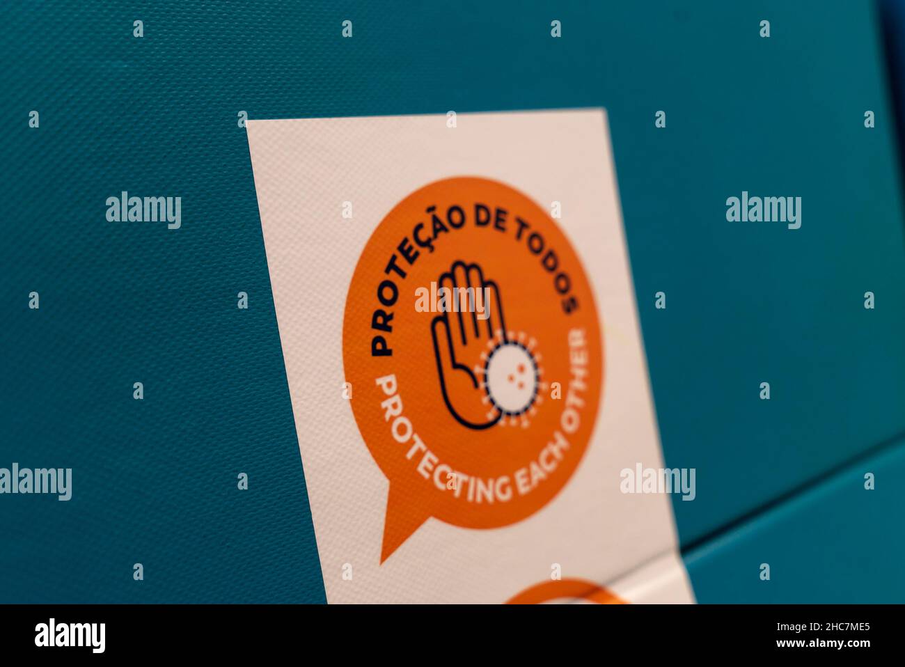 Sign suggesting to protect each other by keeping social distance during ...