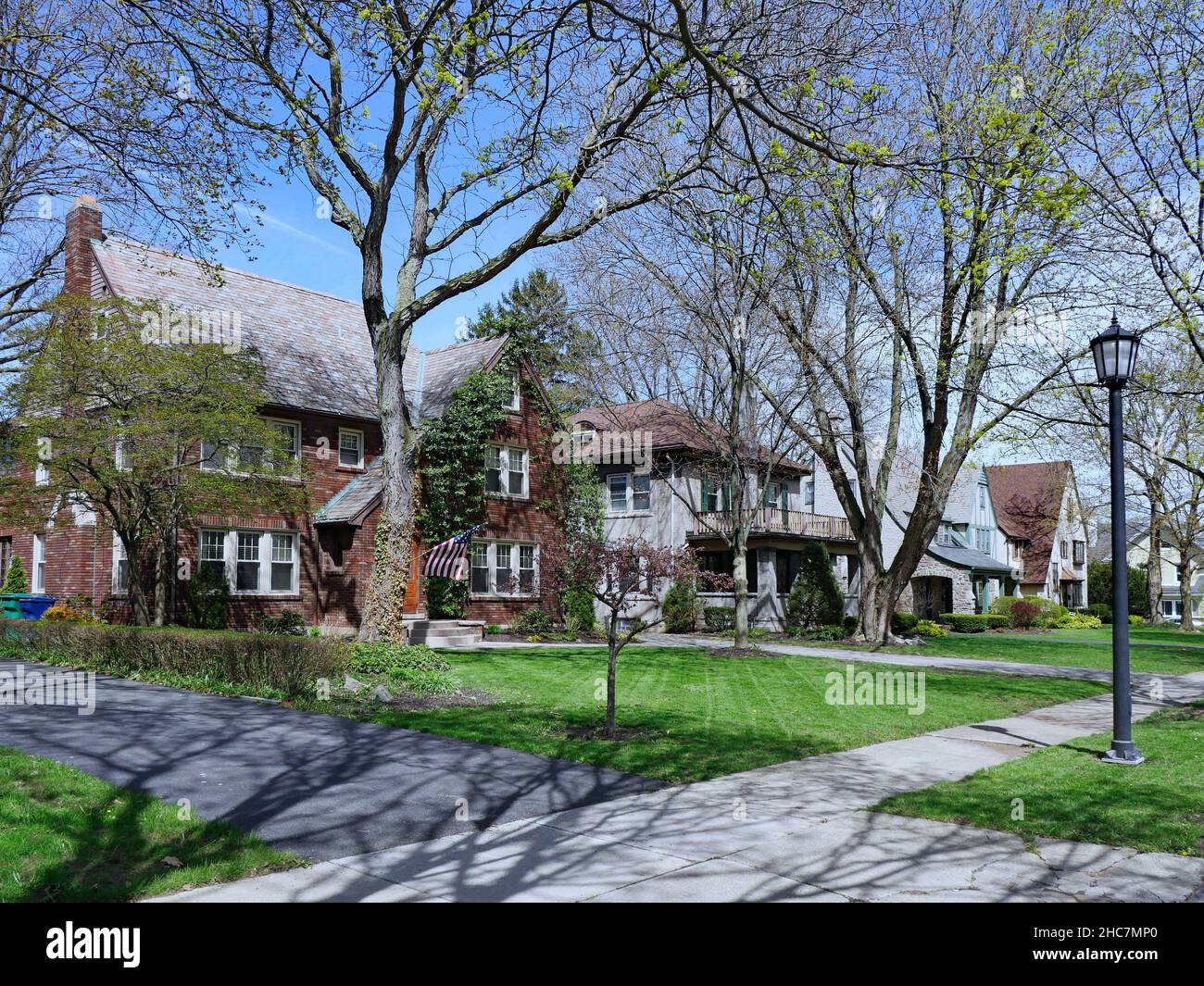 Suburban residential street with traditional two story houses Stock ...