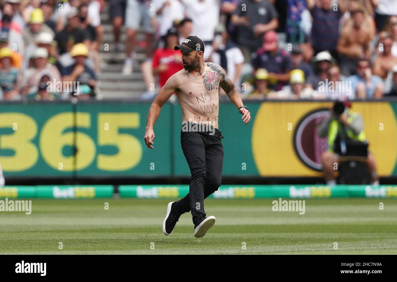 A pitch invader enters the field during day one of the third Ashes test ...