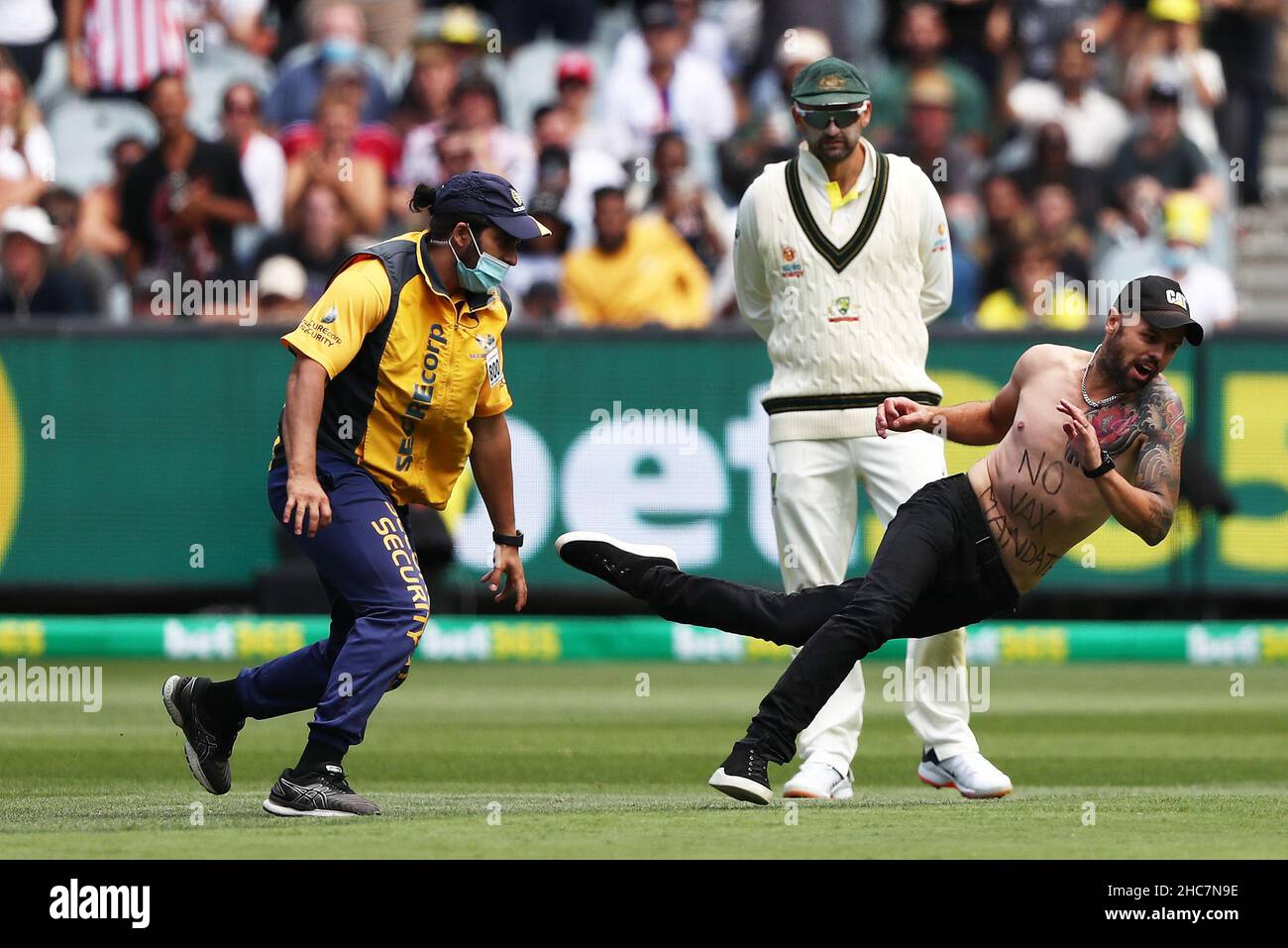 A pitch invader enters the field during day one of the third Ashes test ...