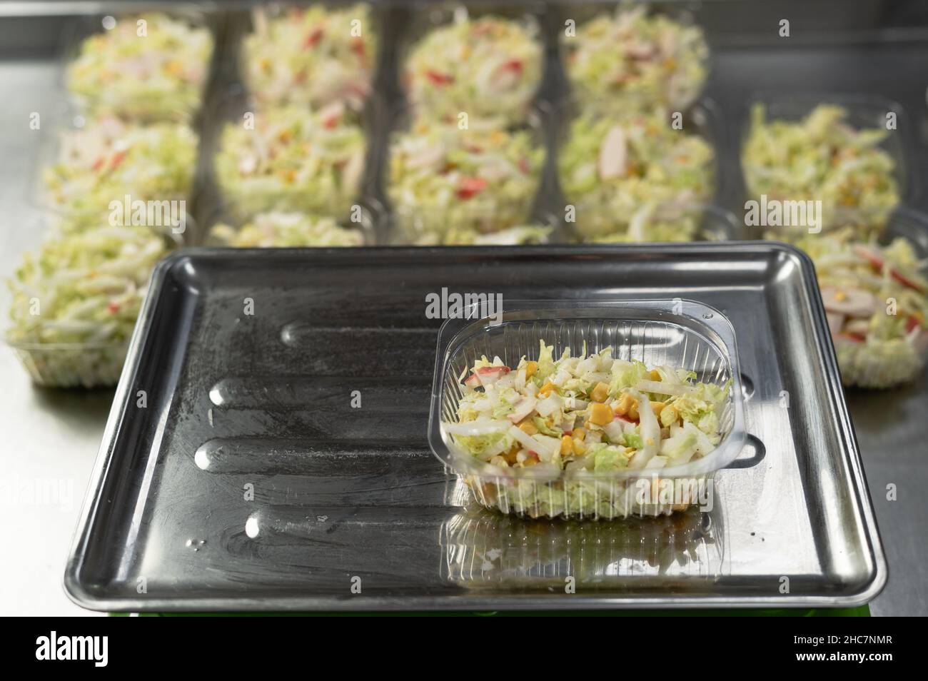 Food delivery. the chef prepares food in the restaurant and prepares it ...