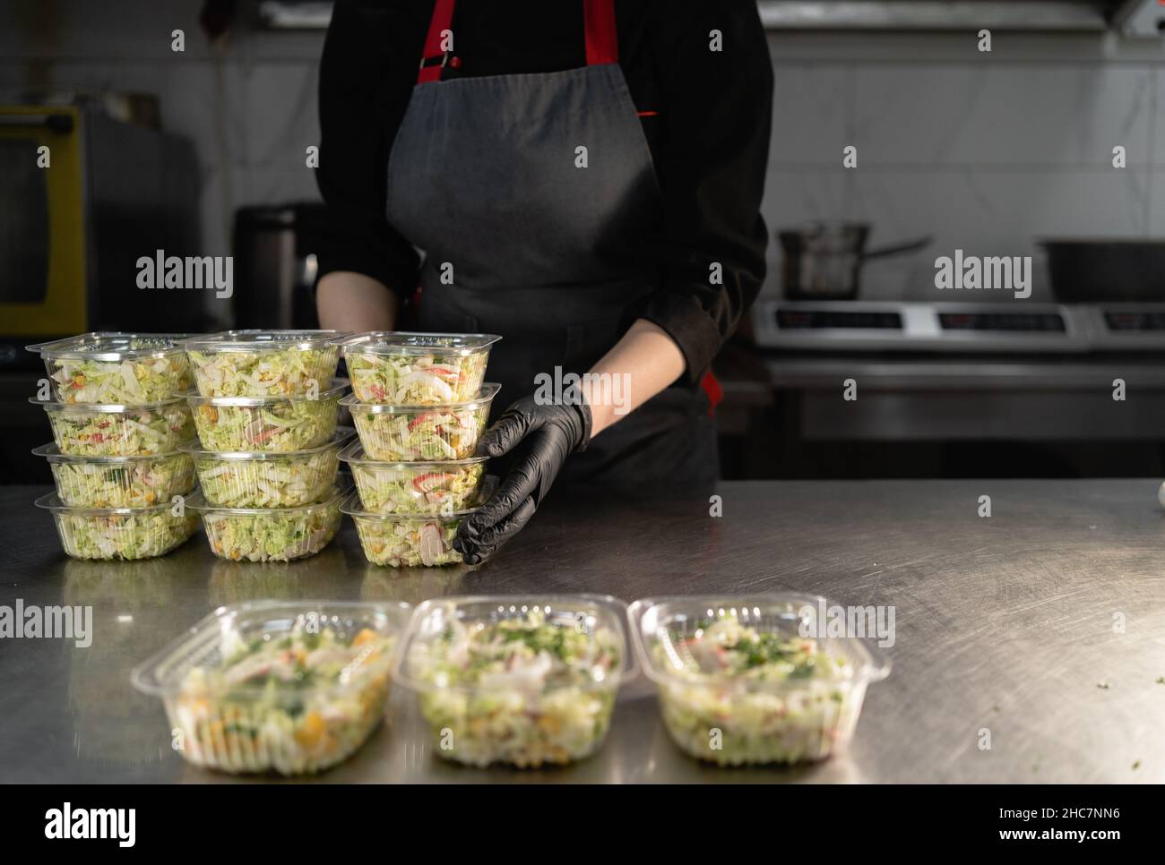 Disposable food items are ready for delivery. In the restaurant, the ...