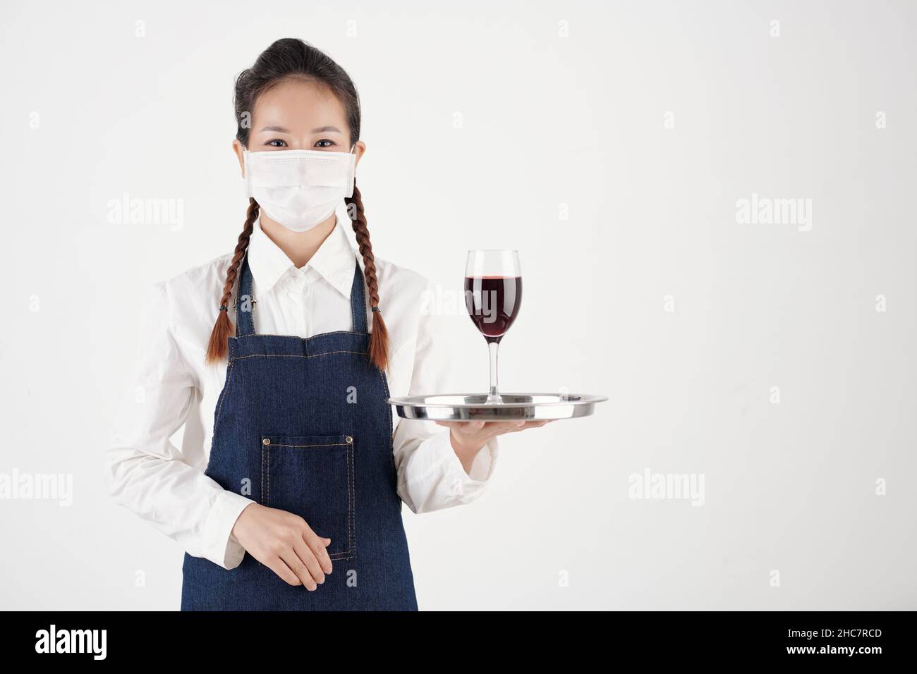 Waitress in mask tray standing hi-res stock photography and images - Alamy