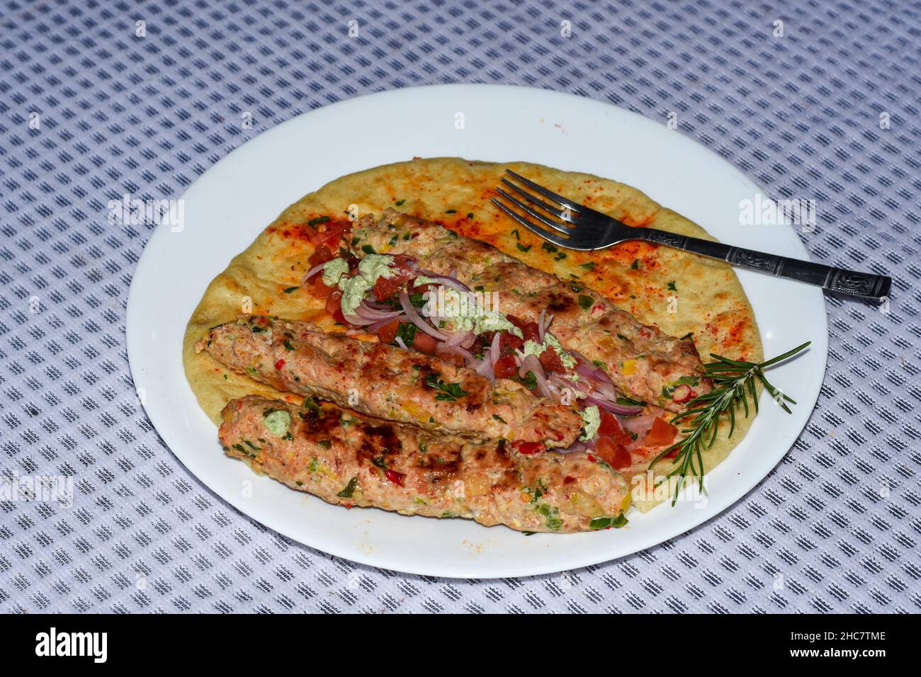 Turkish Chicken Adana Kebab with Turkish Naan and Salad Stock Photo - Alamy