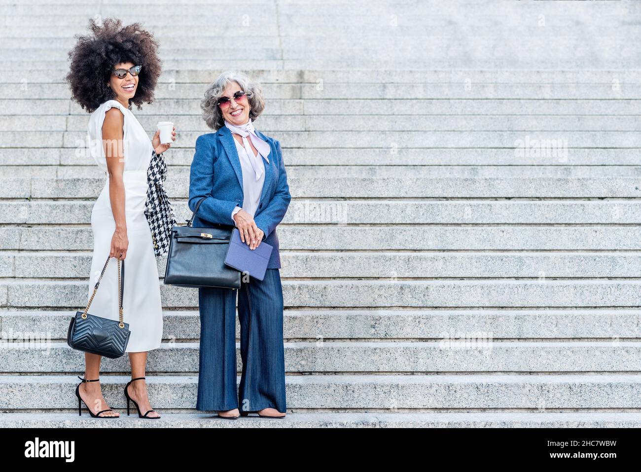 Two joyful women smiling hi-res stock photography and images - Alamy