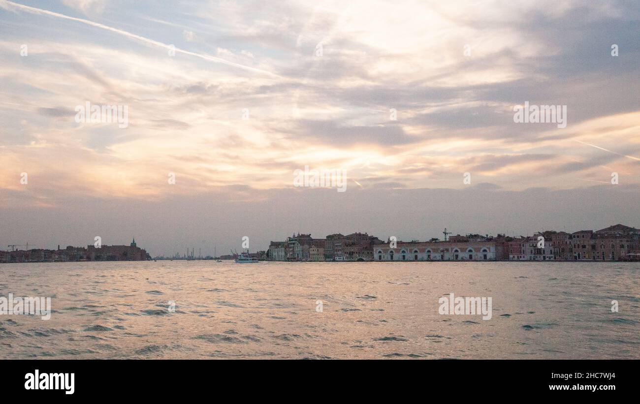 Venice lagoon on sunset, Italy. Old italian architecture in Venezia ...