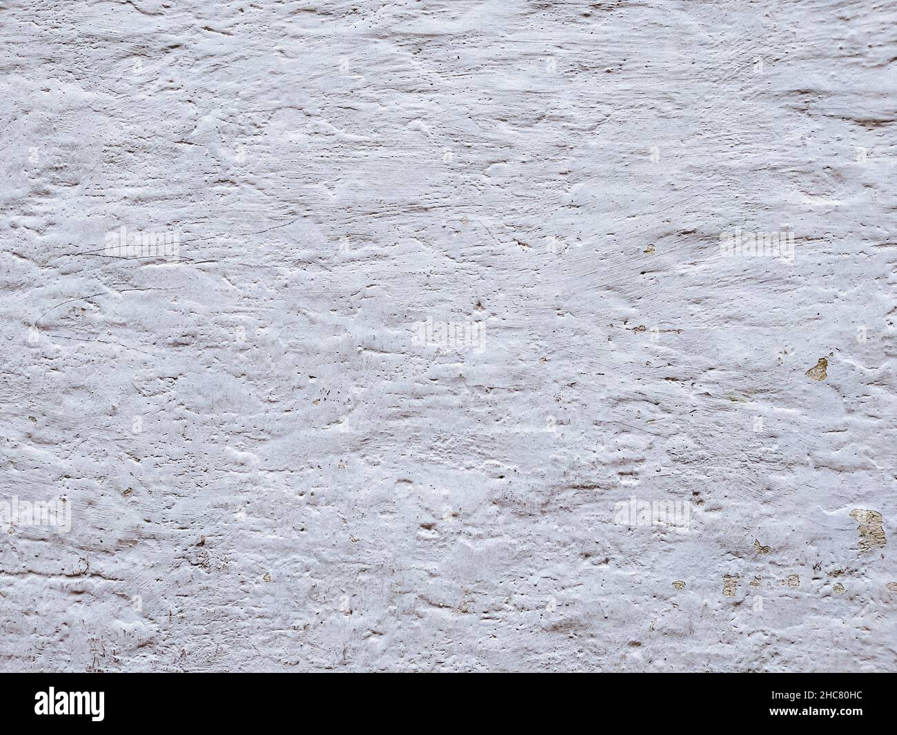 White textured stucco wall background. White stucco wall. Background of ...