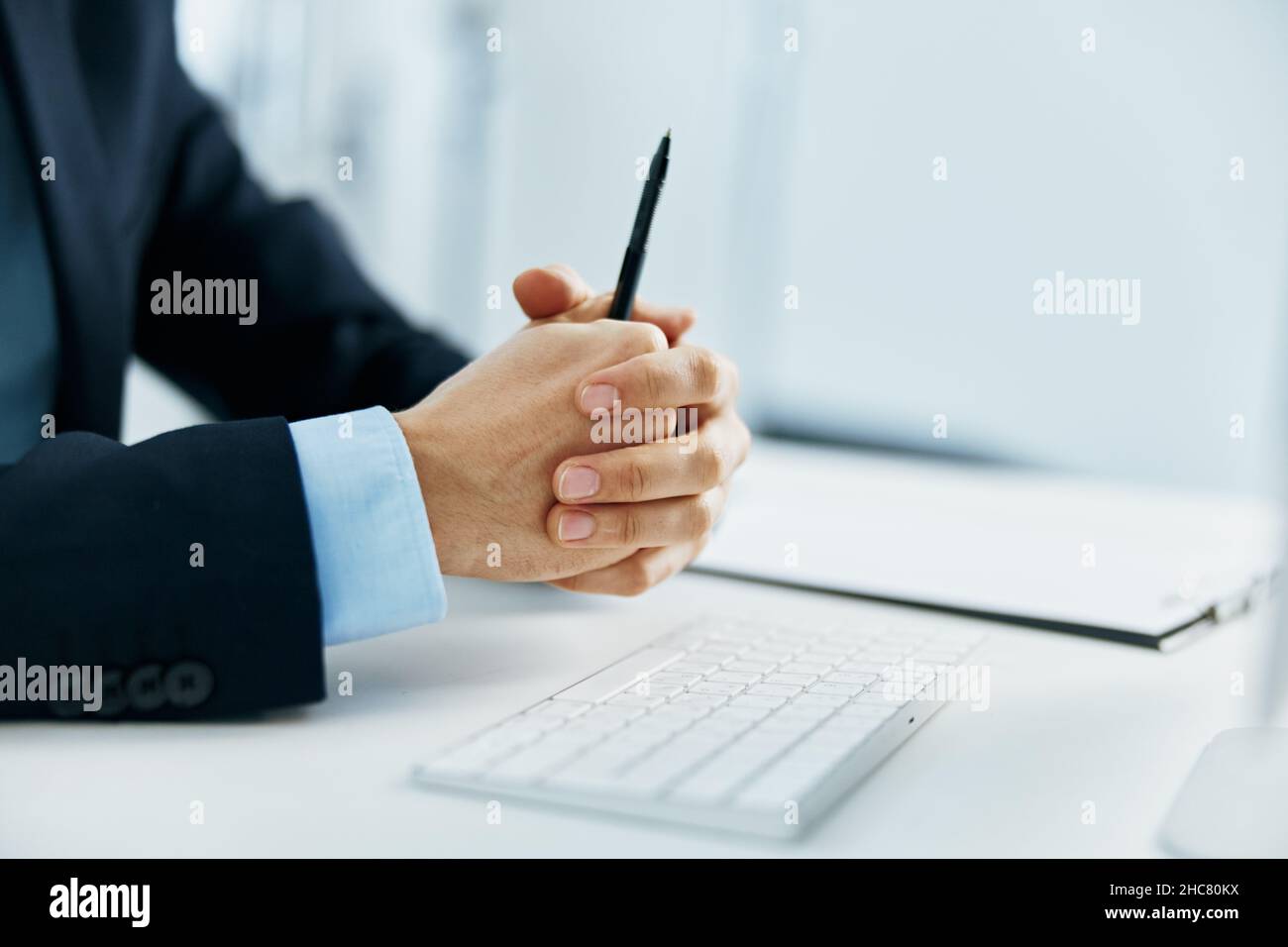 business man at his desk in front of a computer Stock Photo - Alamy