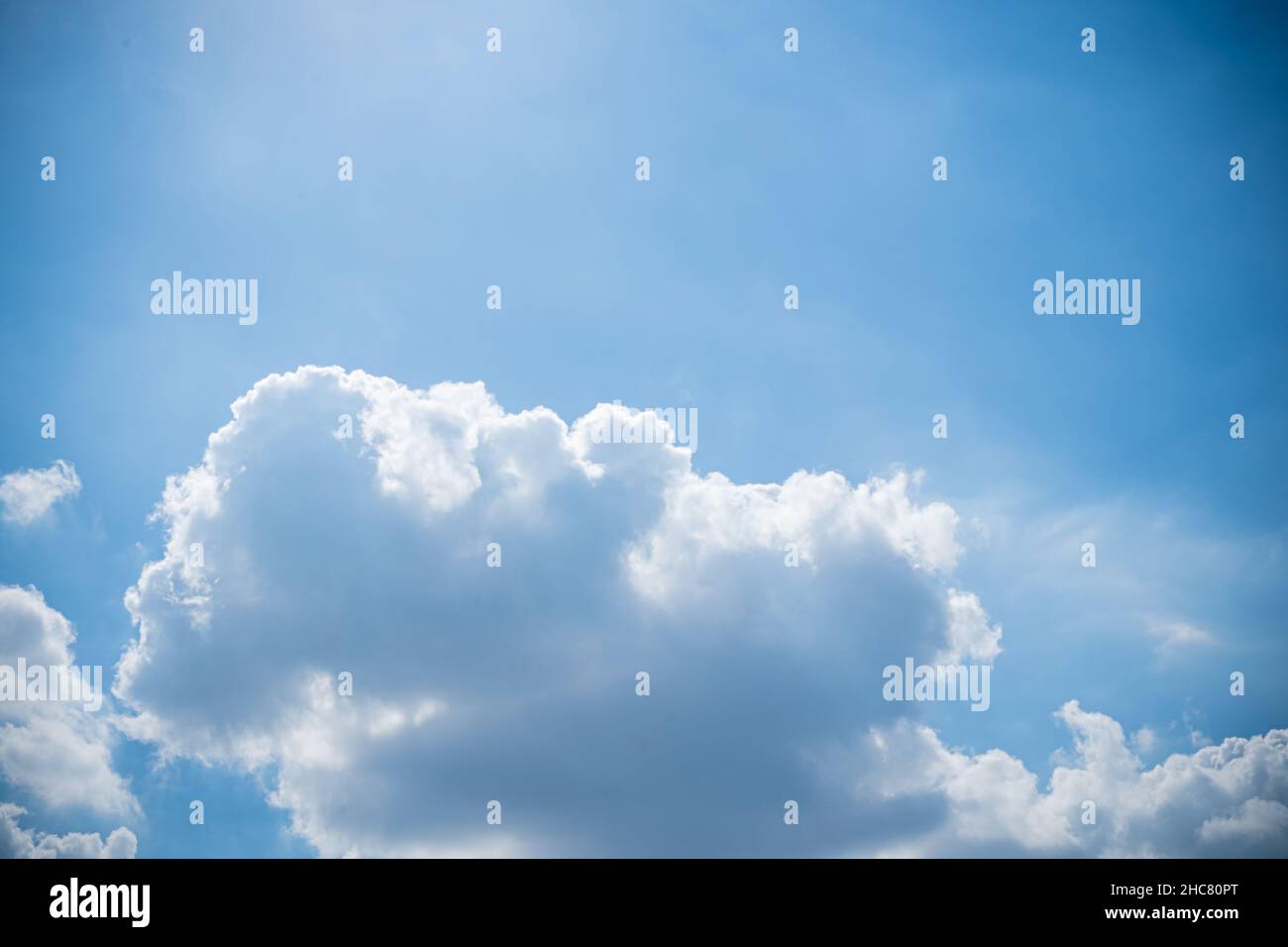 white fluffys clouds sky background with blue sky background for copy ...