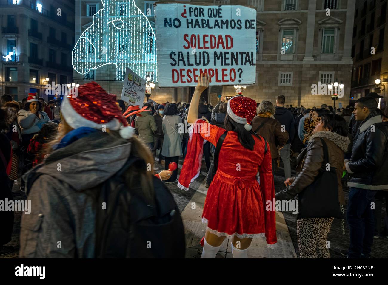 Barcelona, Spain. 25th Dec, 2021. A protester dressed as Santa Claus ...