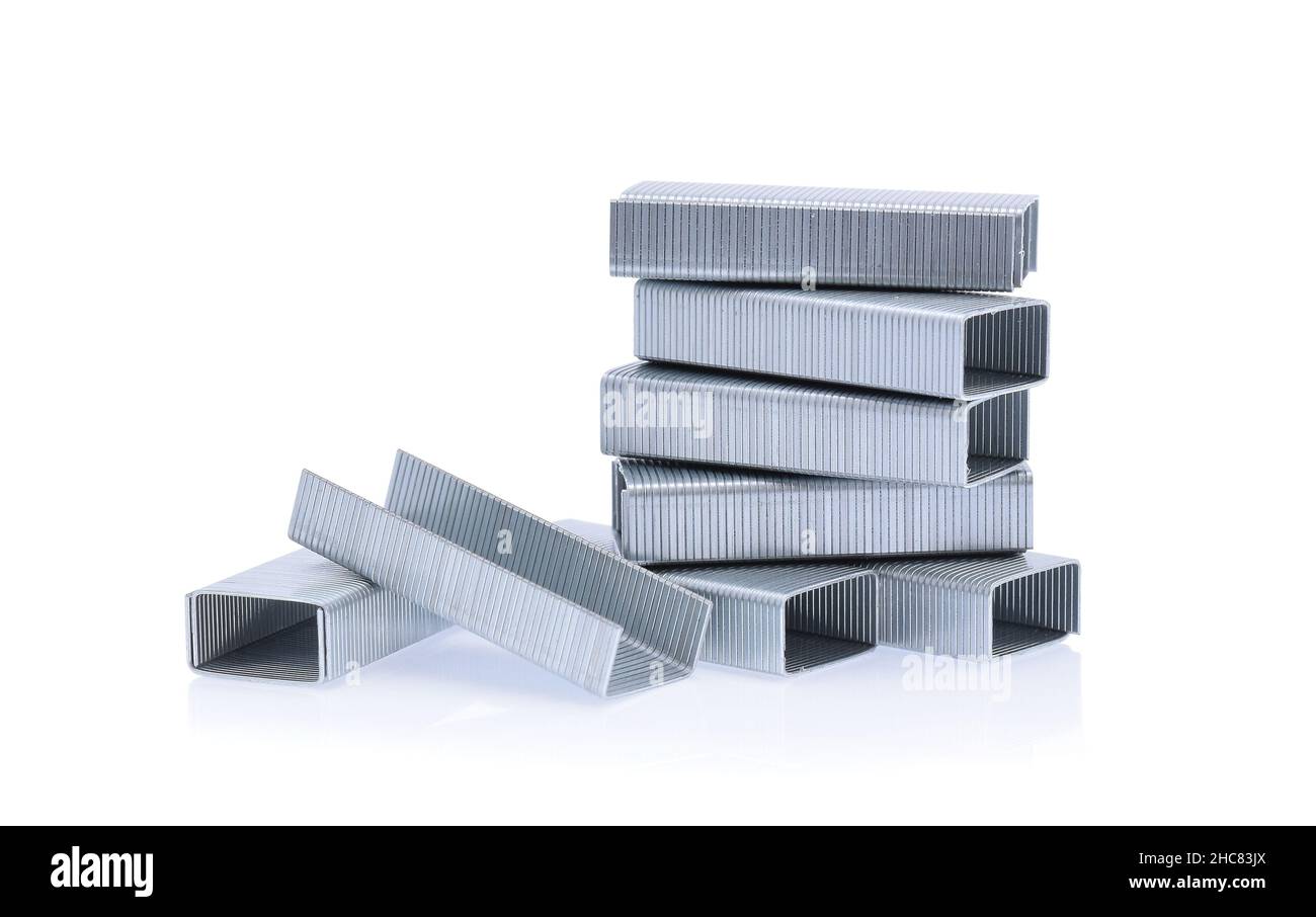 Stack of metal staples isolated on white background Stock Photo - Alamy