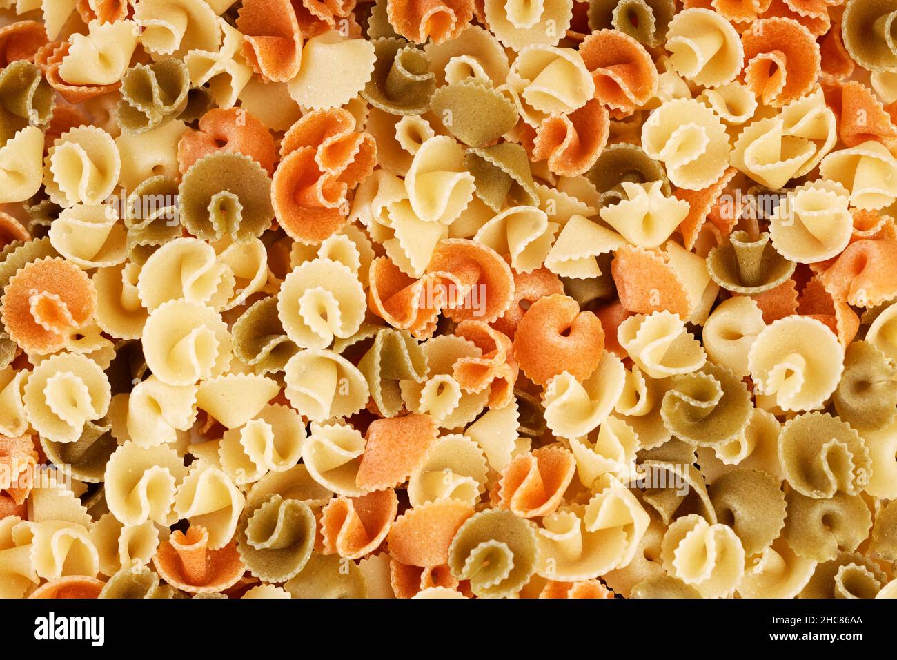 Closeup view of wheat pasta. Top view. Food background Stock Photo - Alamy