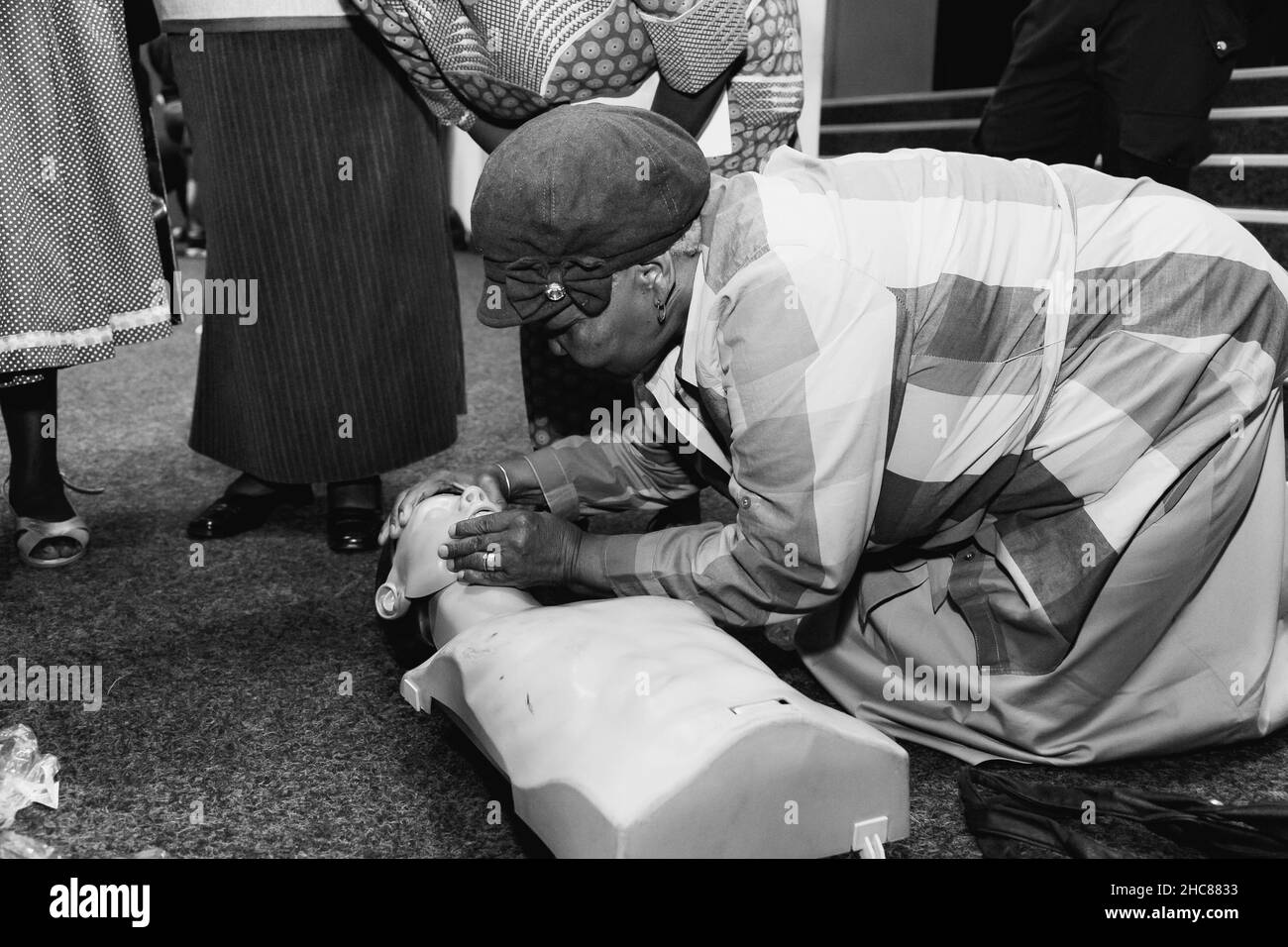 First Aid CPR training with a plastic dummy Stock Photo - Alamy