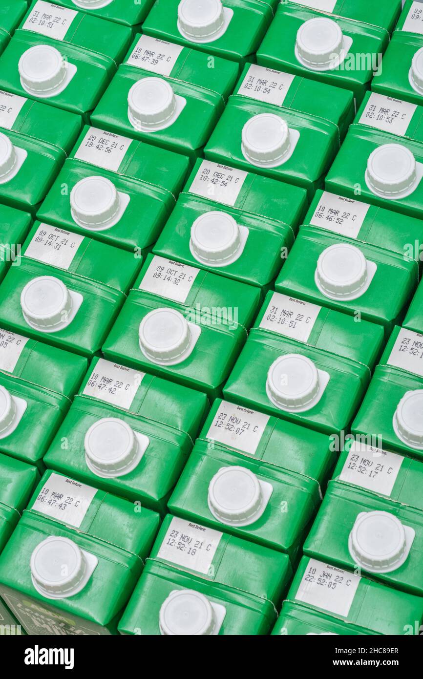 Shot of paper carton top lids of ASDA own-label long-life UHT semi ...