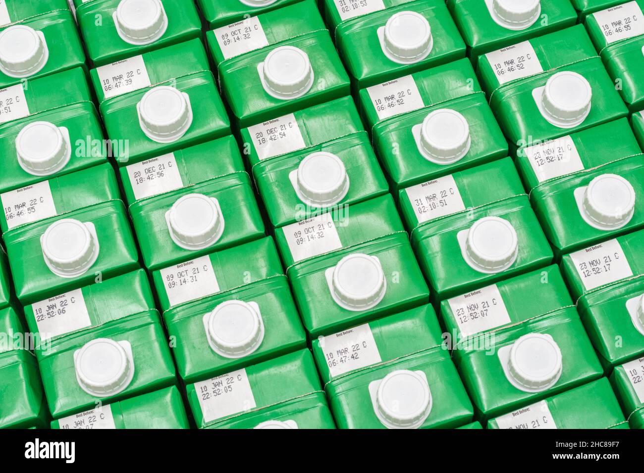 Paper carton top lids of ASDA own-label long-life UHT semi-skimmed milk ...