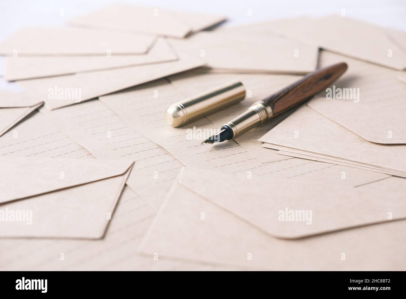 envelope , empty paper and fountain pen on table Stock Photo - Alamy