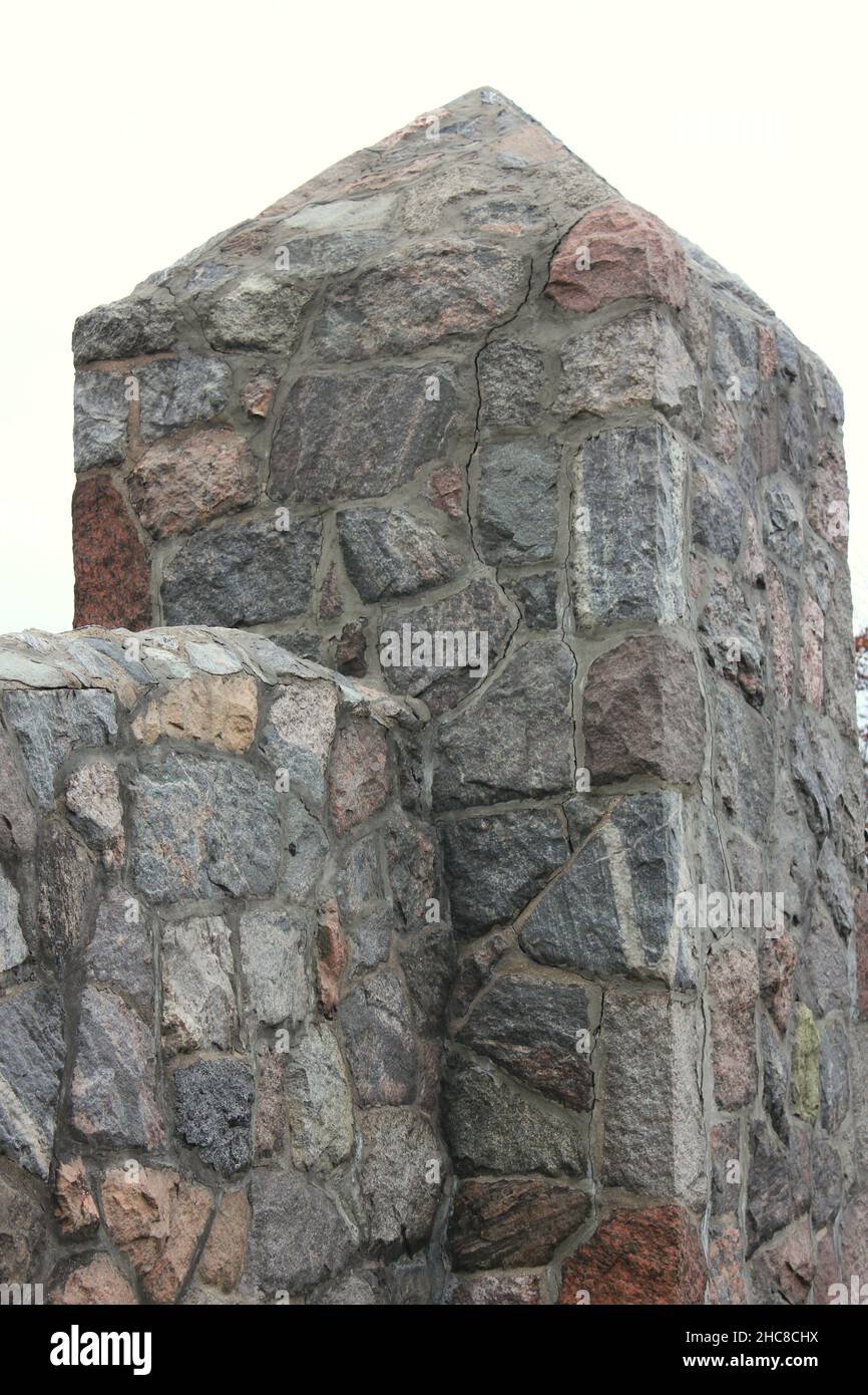 Old stone wall built from huge granite boulders, stones, and rocks ...