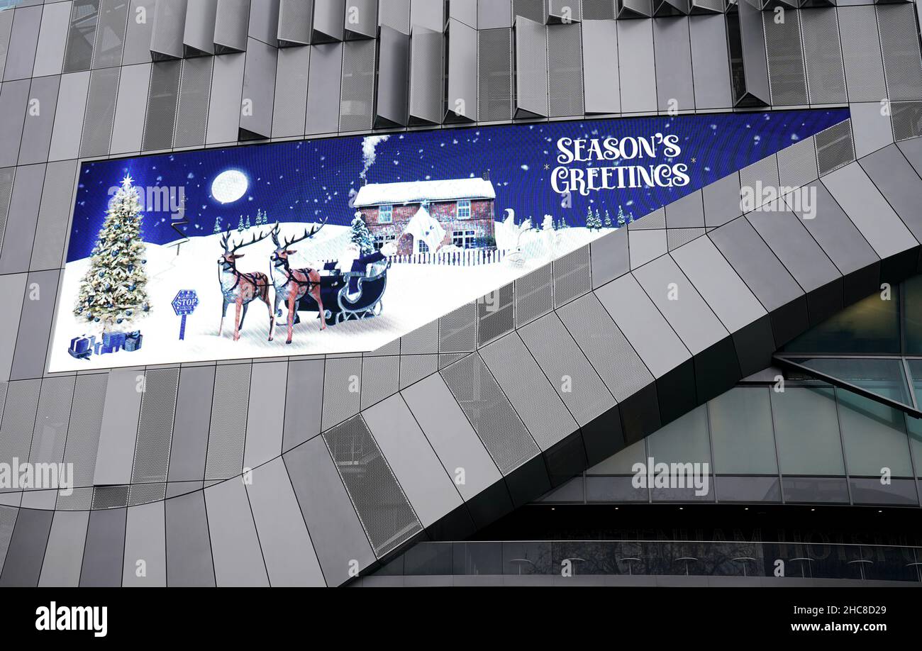 Christmas signage on the Tottenham Hotspur Stadium, London. Picture ...