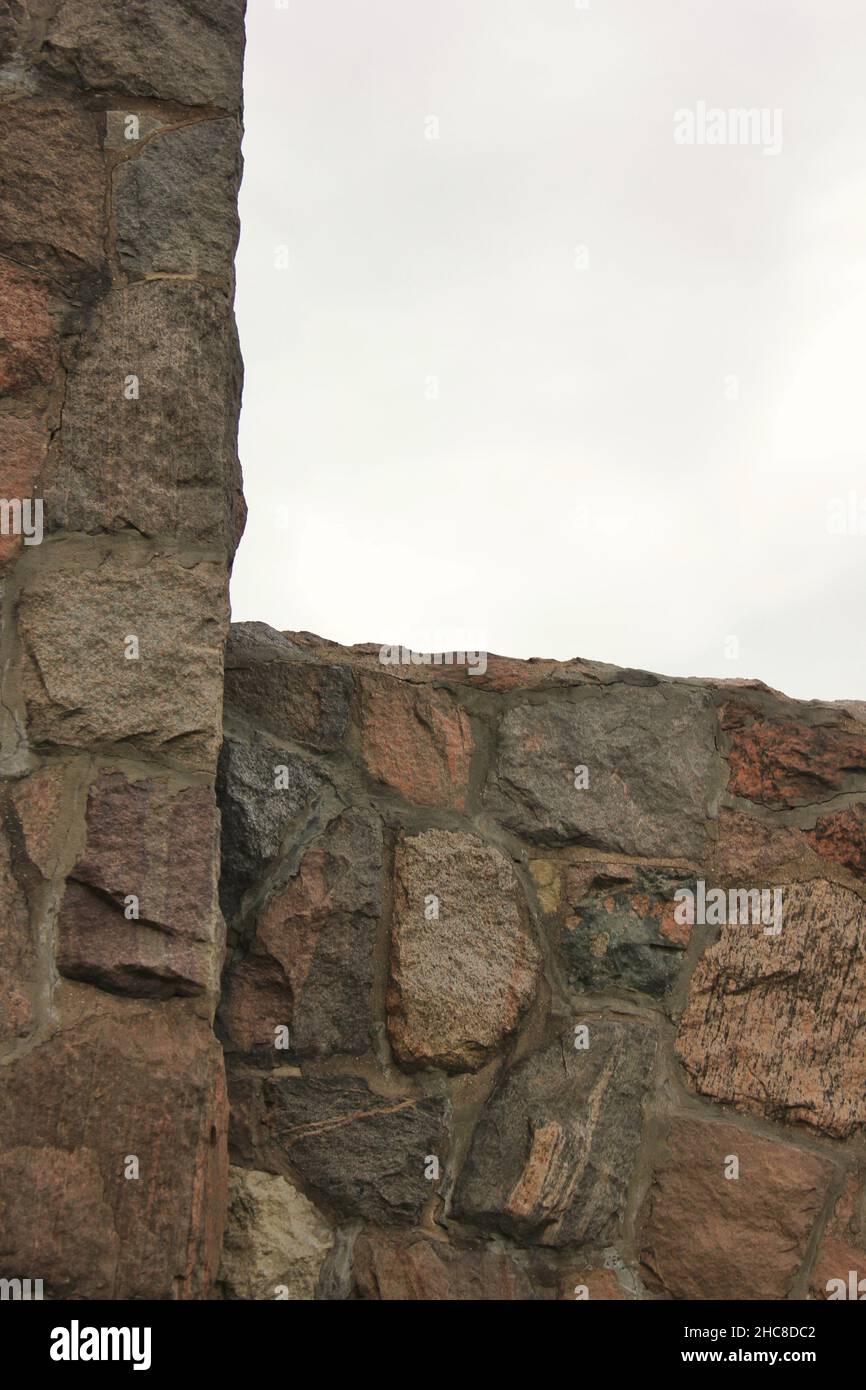 Old stone wall built from huge granite boulders, stones, and rocks ...