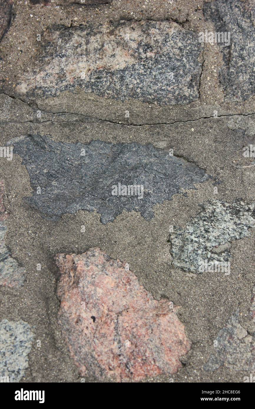 Old stone wall built from huge granite boulders, stones, and rocks ...