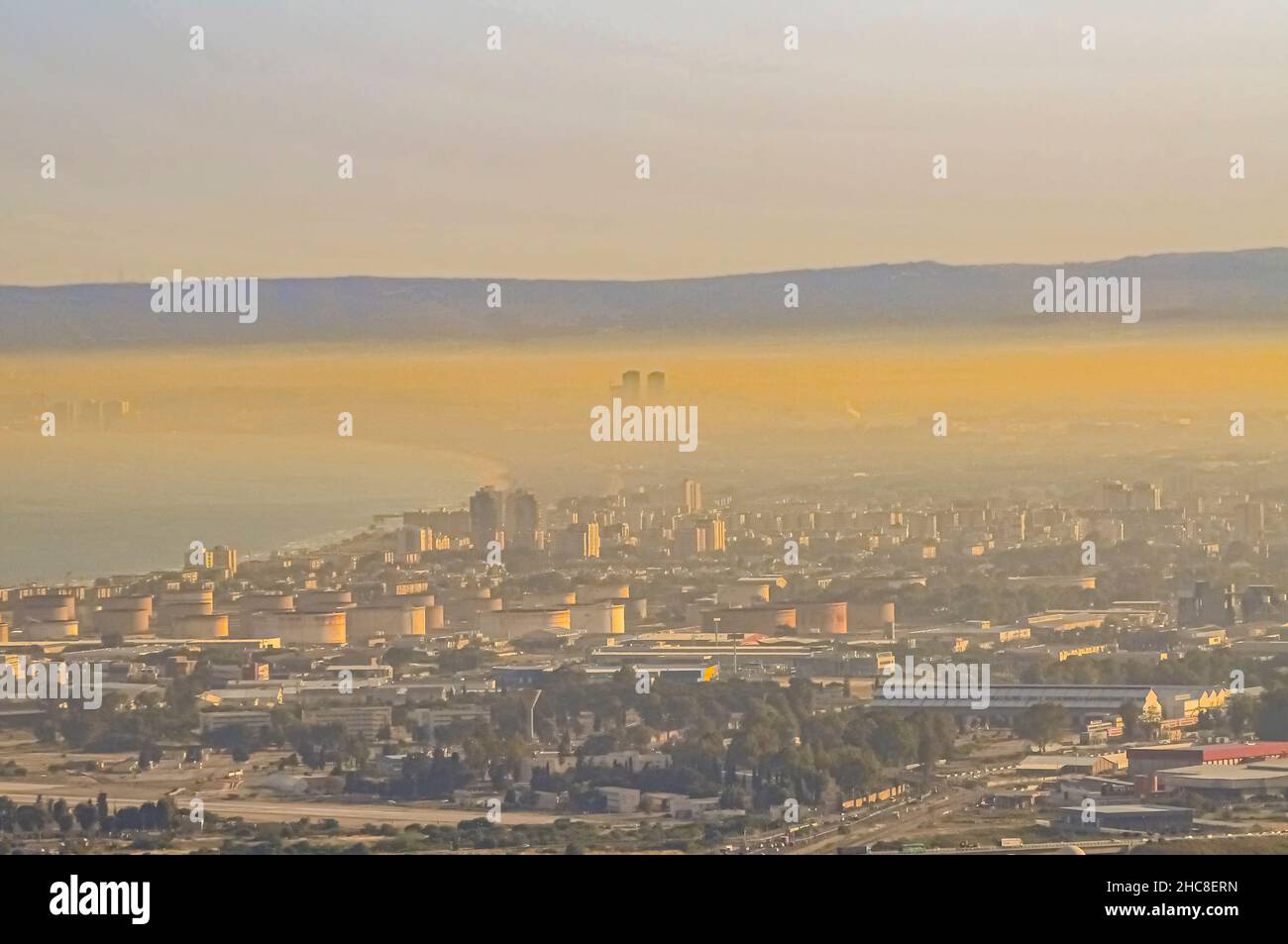 Petrochemical factory and Oil Refinery in smoke and smog. The Inversion ...