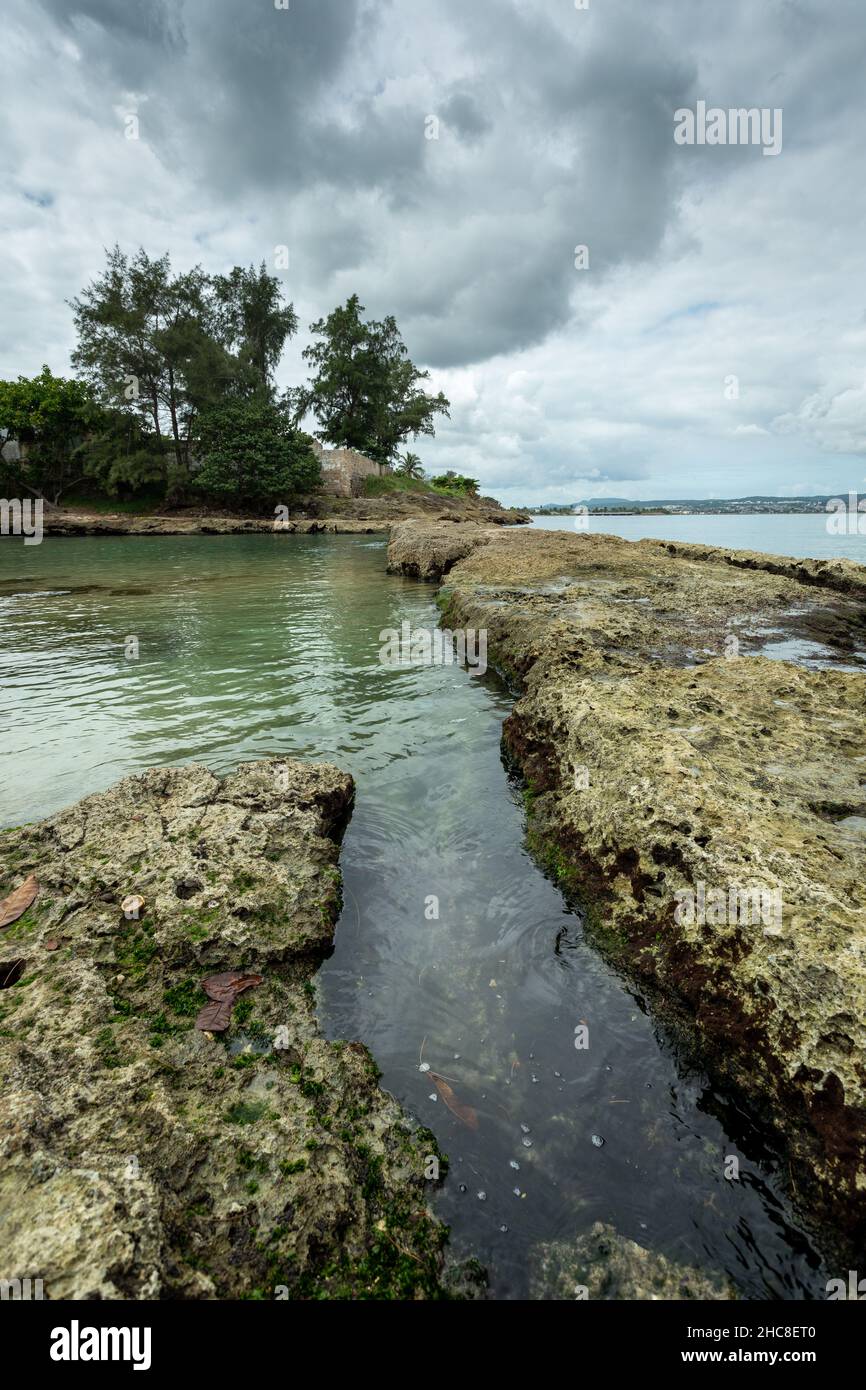 The crack in the rocks that the crystal clear water of the beach pass ...