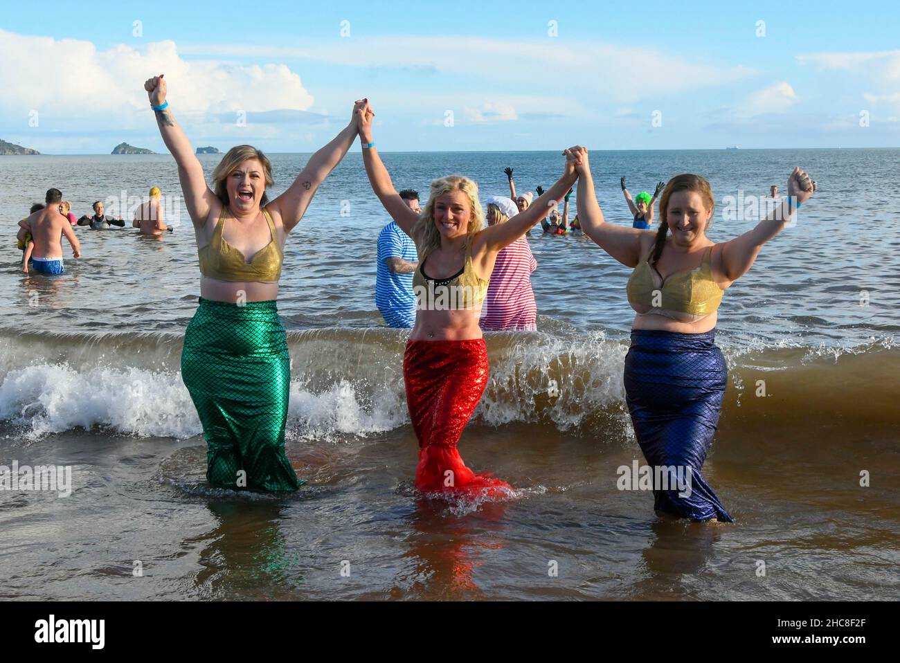 Paignton, Devon, UK. 26th December 2021. UK Weather. Swimmers in ...