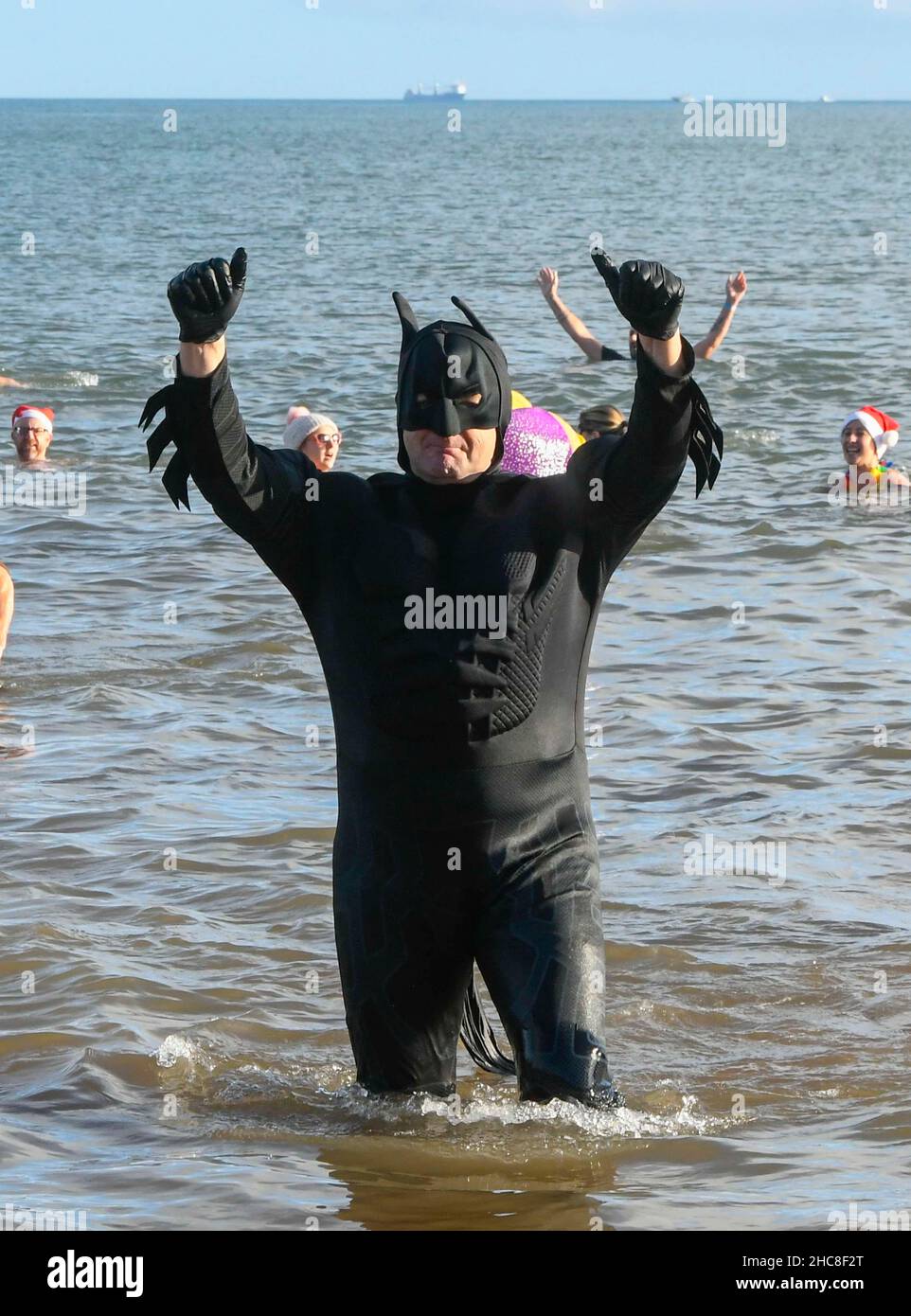 Paignton, Devon, UK. 26th December 2021. UK Weather. Swimmers in ...