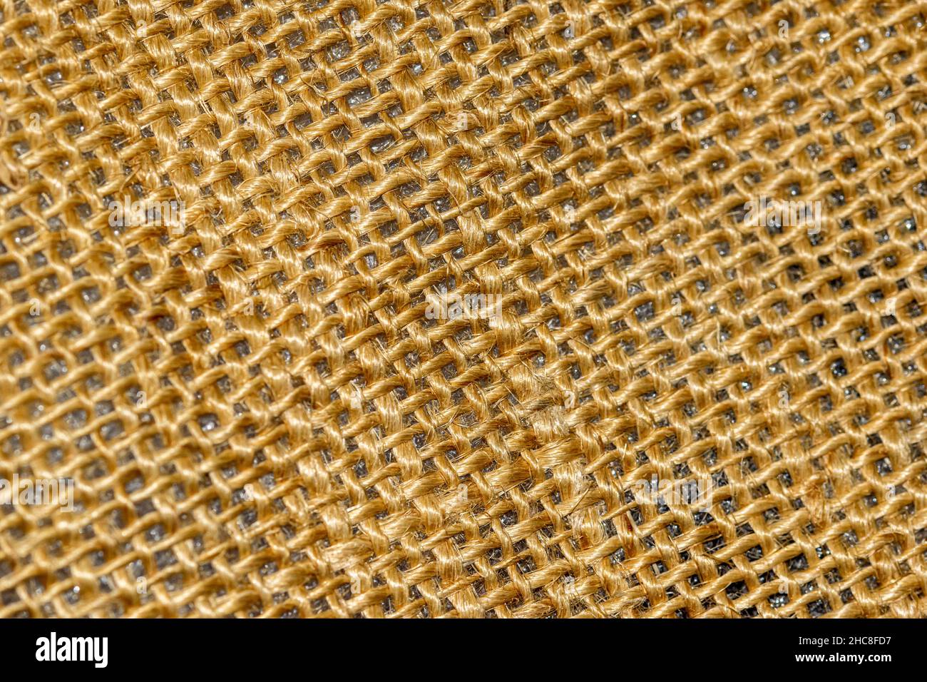 Close up of a tan wicker texture. Wicker straw on cardboard Stock Photo ...