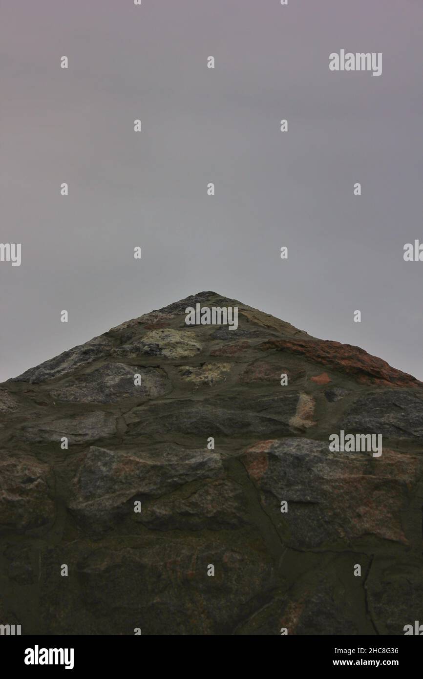 Old stone wall built from huge granite boulders, stones, and rocks ...