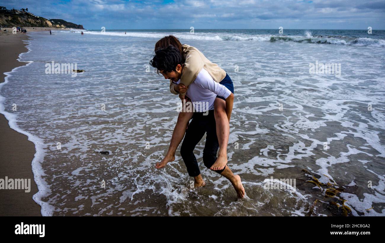 Girl riding piggyback hi-res stock photography and images - Alamy