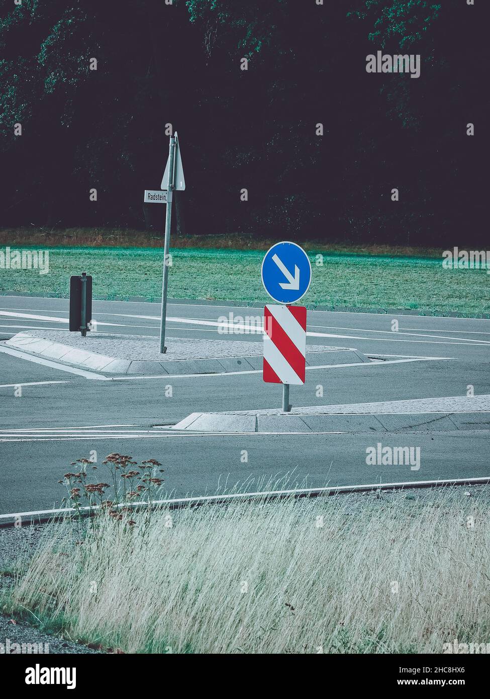 Vertical shot of a route with signs Stock Photo - Alamy