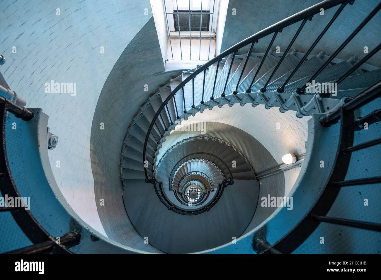 Looking down circular staircase inside historic lighthouse Stock Photo ...
