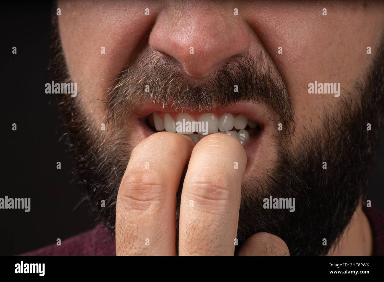 Biting teeth hi-res stock photography and images - Alamy