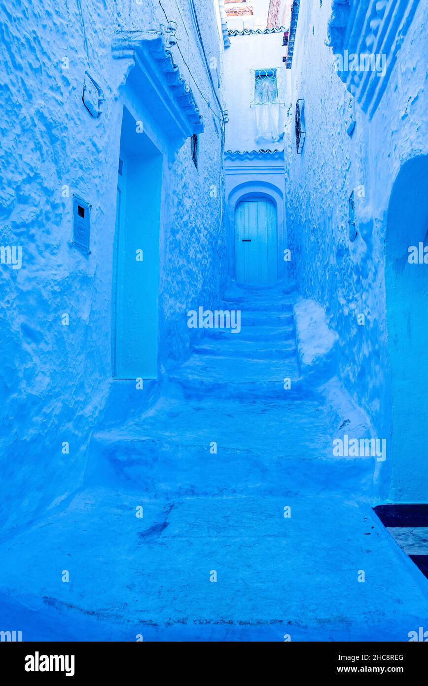 The famous blue colored house with traditional arched wooden door Stock ...