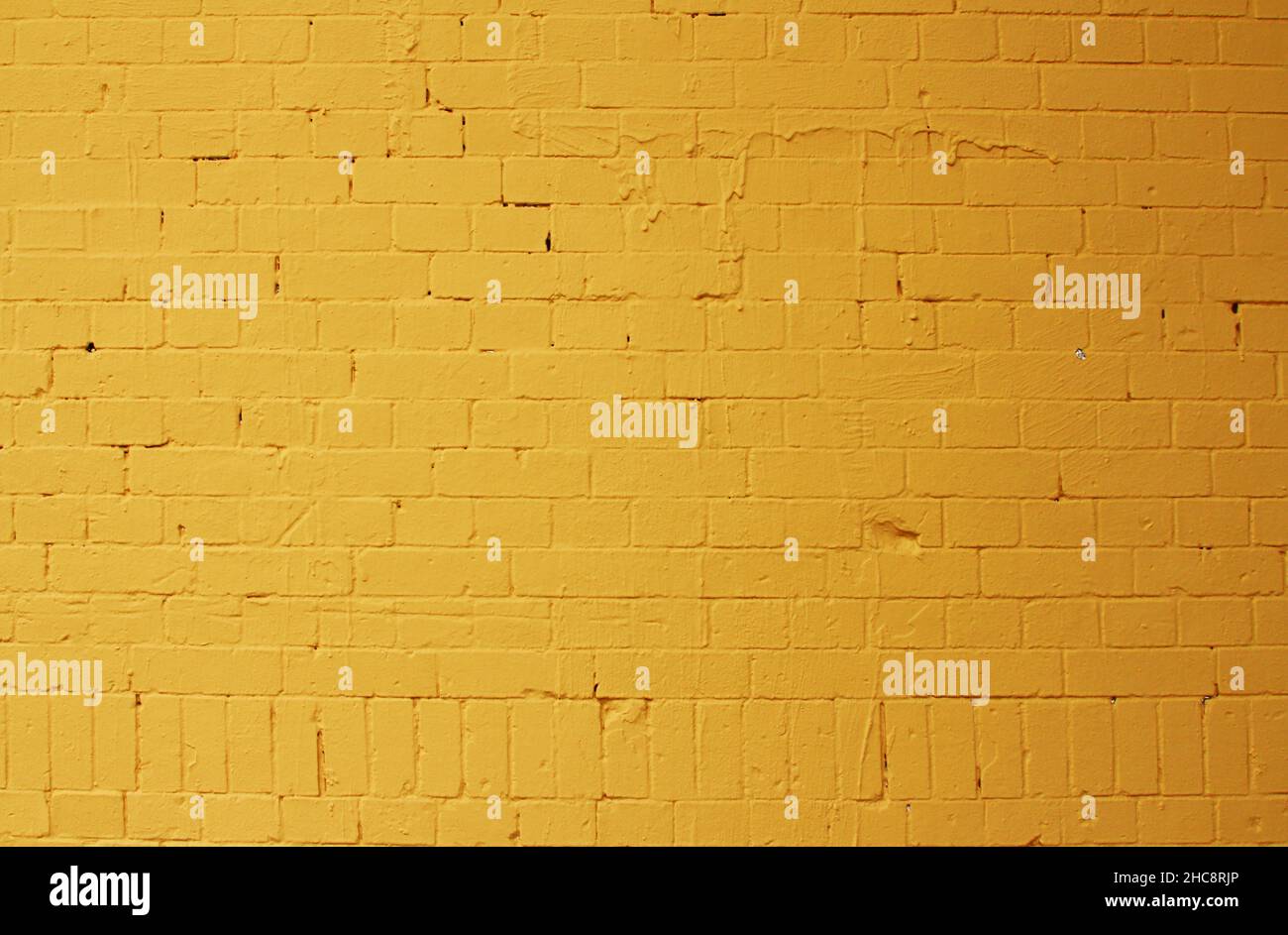 Background pattern texture made from a bright yellow brick wall Stock ...