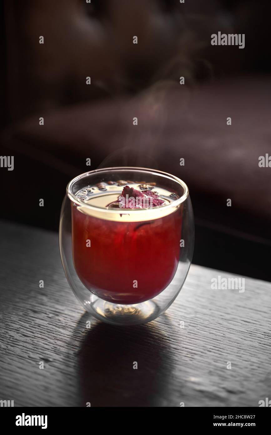 Hot tea in double glass cup, selective focus Stock Photo - Alamy