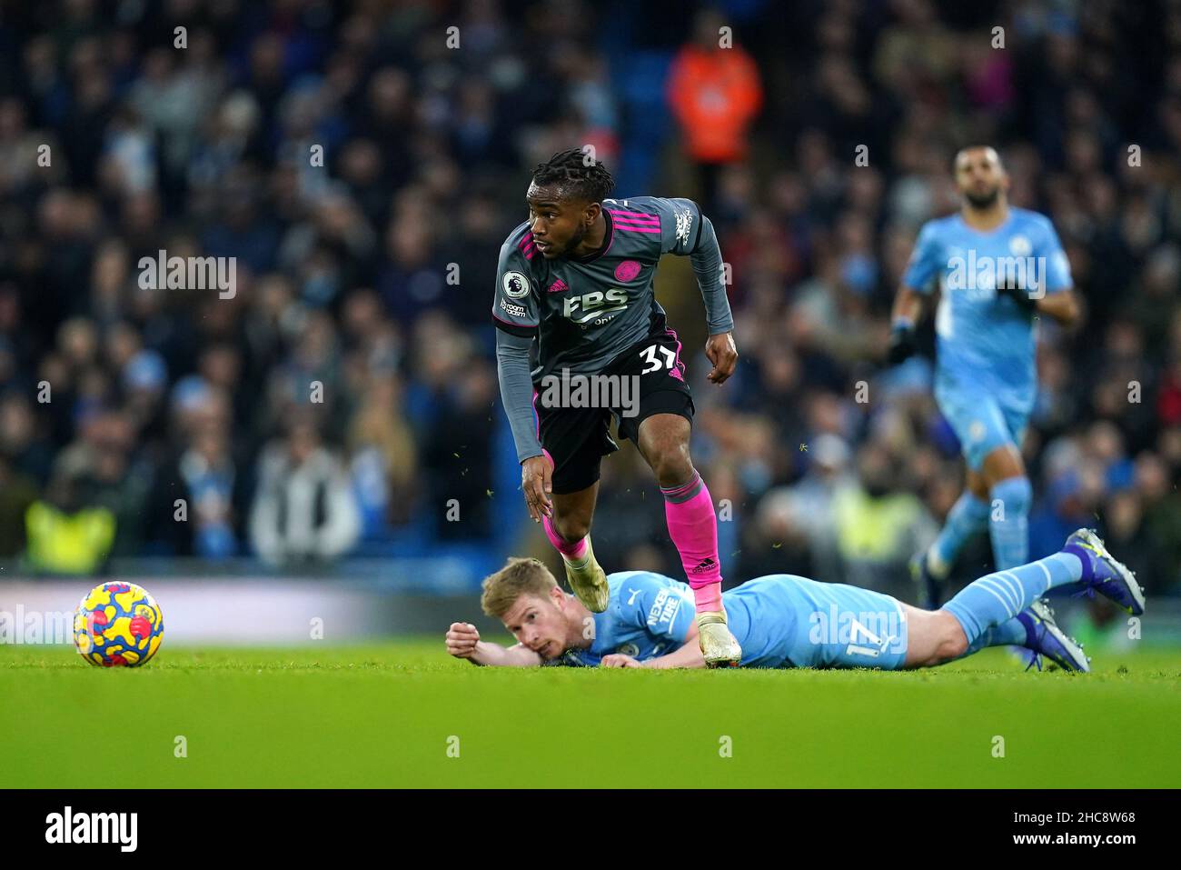 Leicester City's Ademola Lookman gets past Manchester City's Kevin De Bruyne during the Premier ...