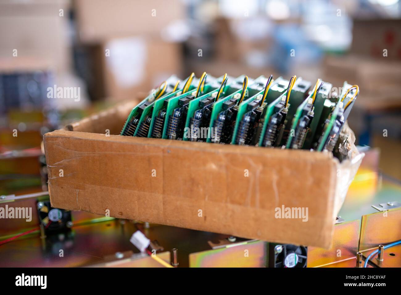 Green control chips of contemporary TFT monitors in small cardboard box ...