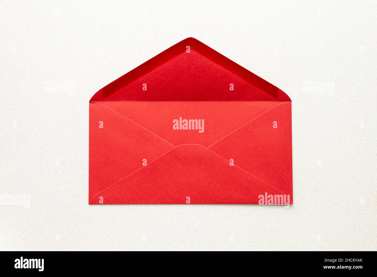 open red envelope on shiny silvery background, jubilee concept Stock ...