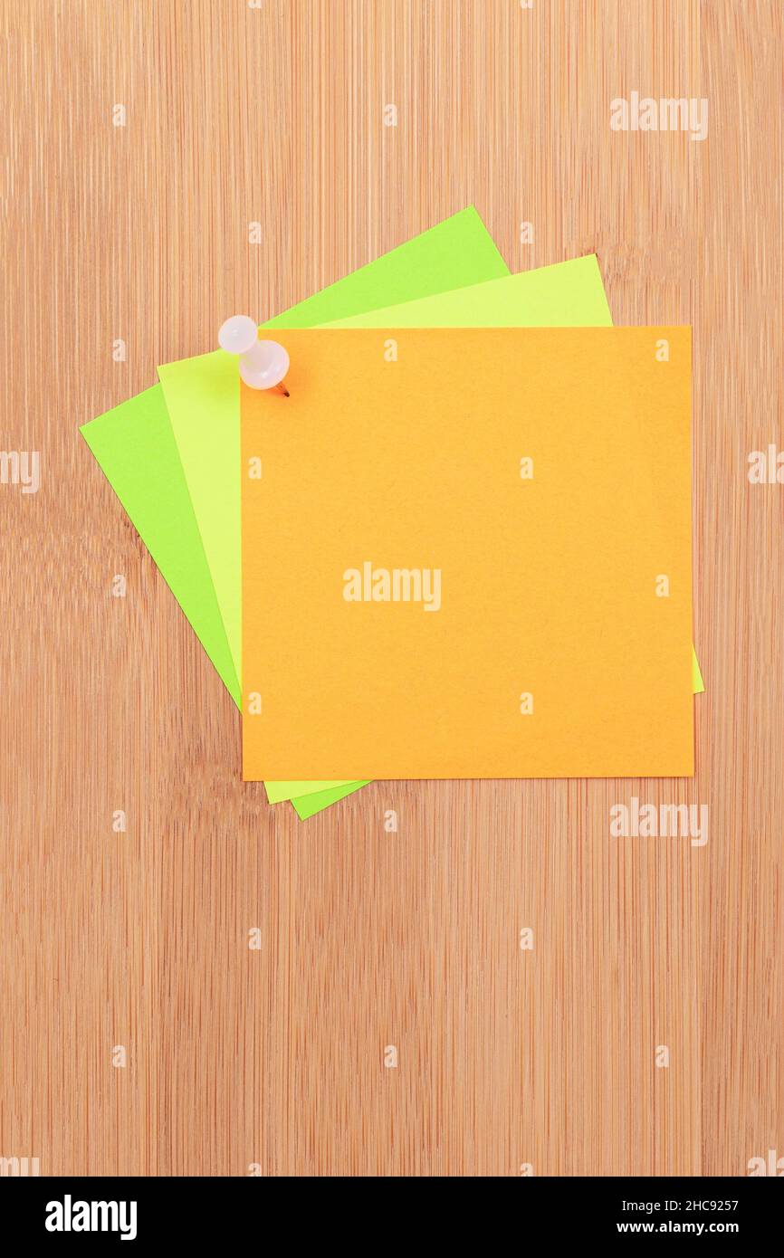 Colored Sticky Notes with Copyspace Pinned to the Wooden Message Board ...