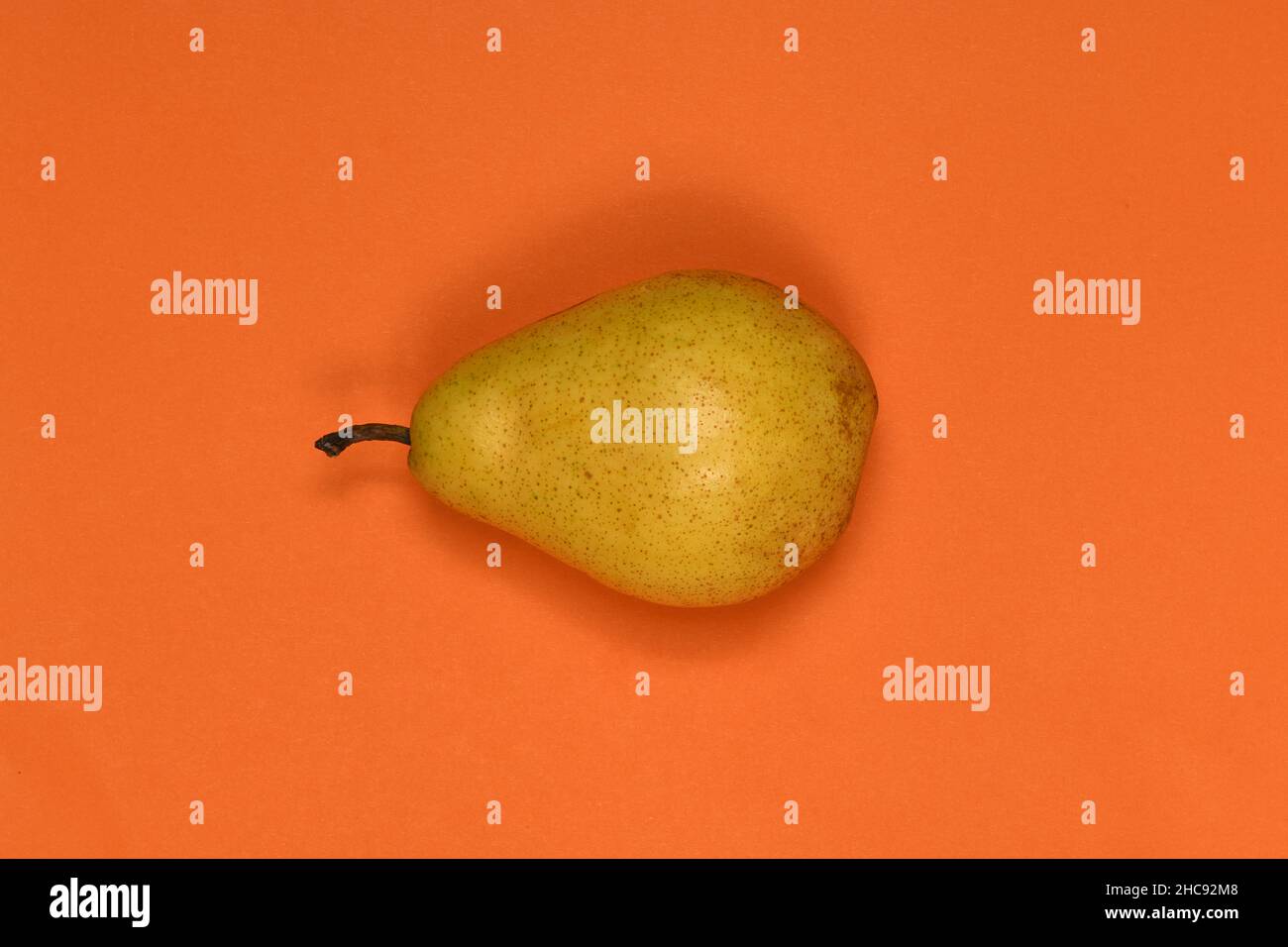 Pears isolated on orange background. Pears macro studio photo. High ...